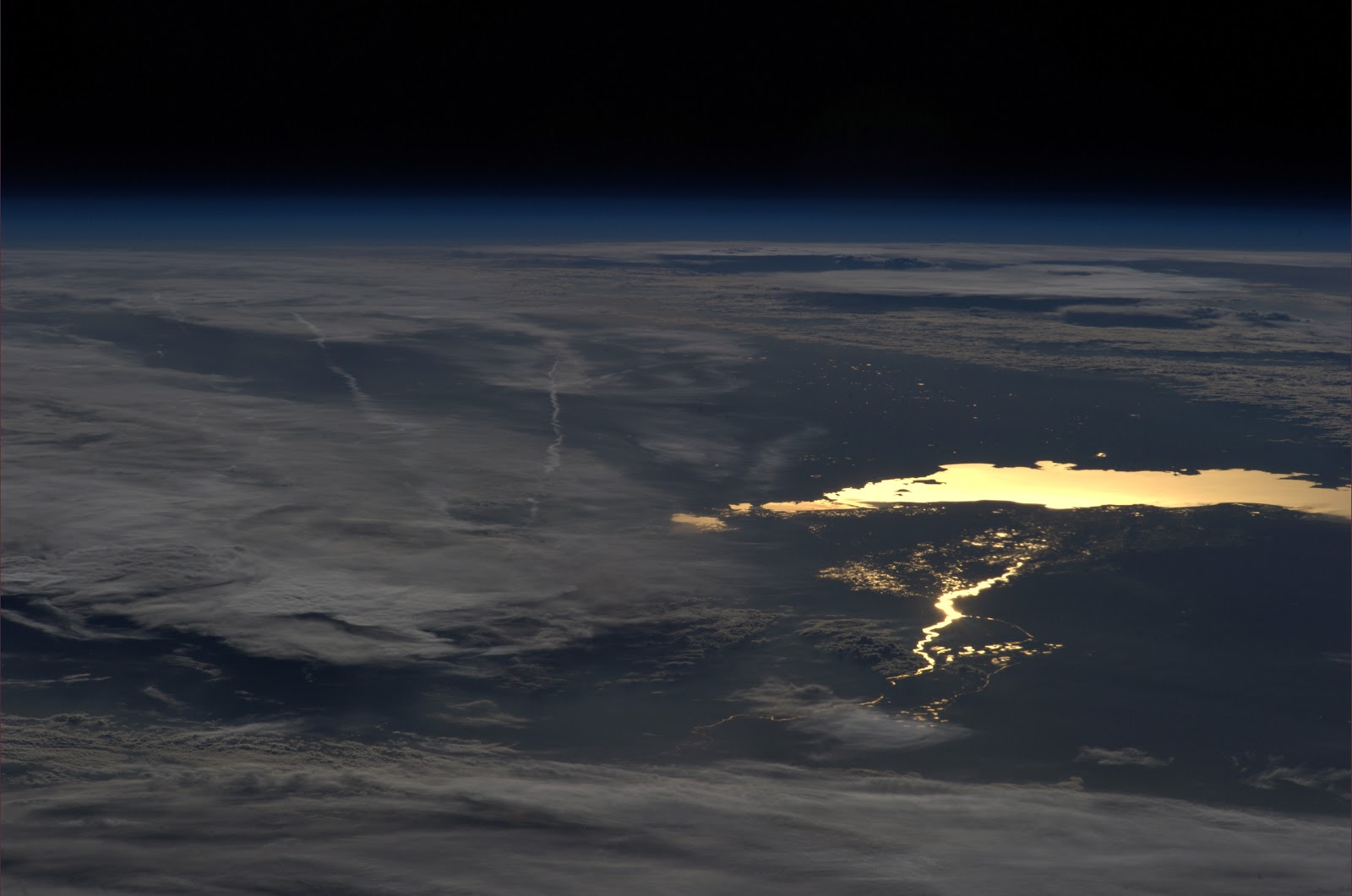 Sun's reflection on lake seen from the International Space Station ...