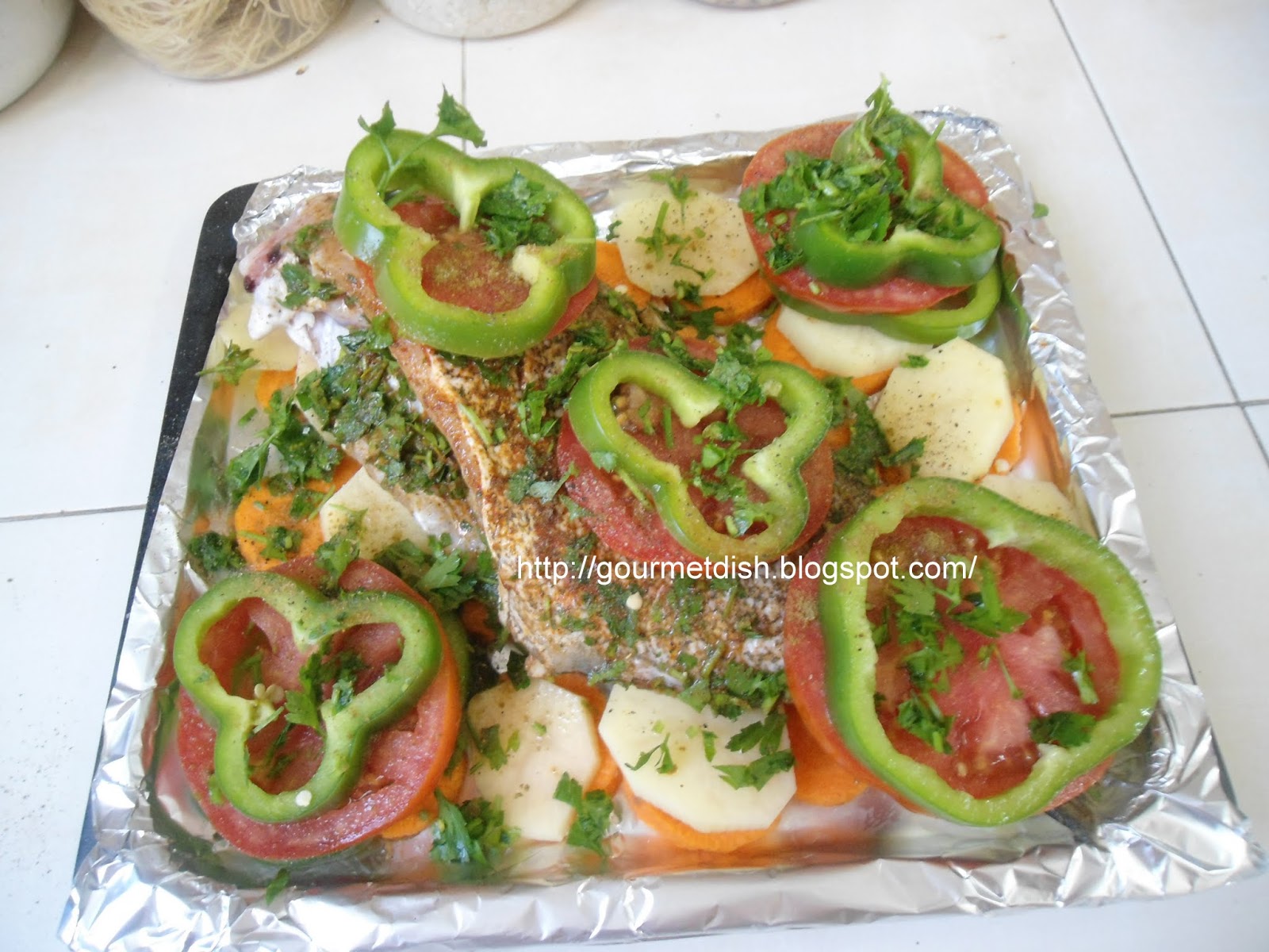 Gourmet Dish: Roast Hamour Fish with Roast Vegetables in the Oven