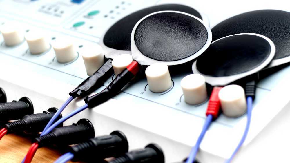 Frequency specific microcurrent