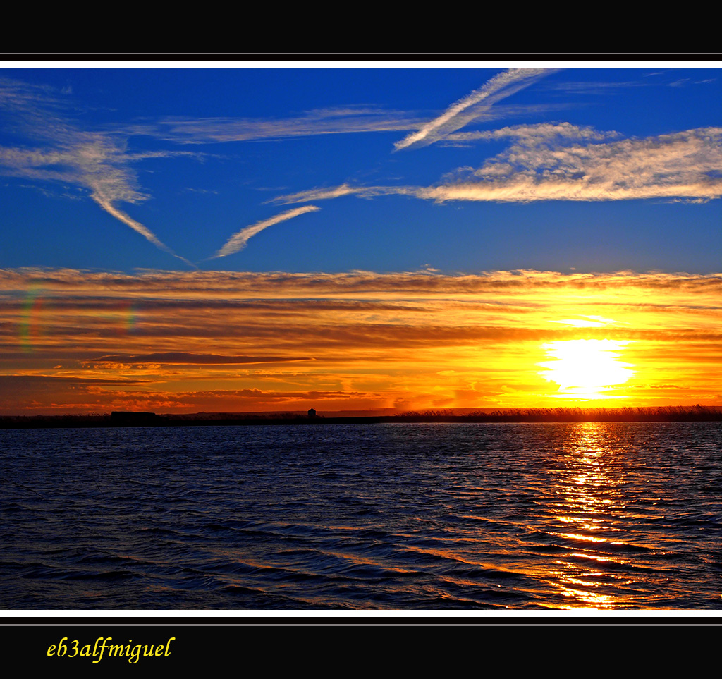 Miguel fotografia: Puesta de sol de una tarde ventosa