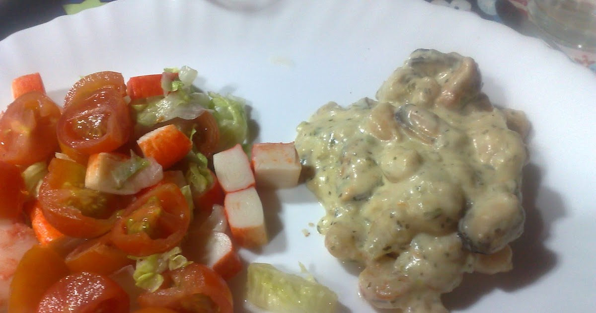 Pollo con salsa de mariscos