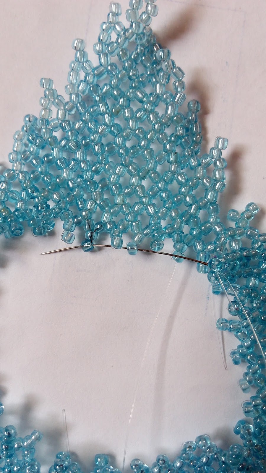 Beadination: Beautiful beaded flower using the bead netting technique.