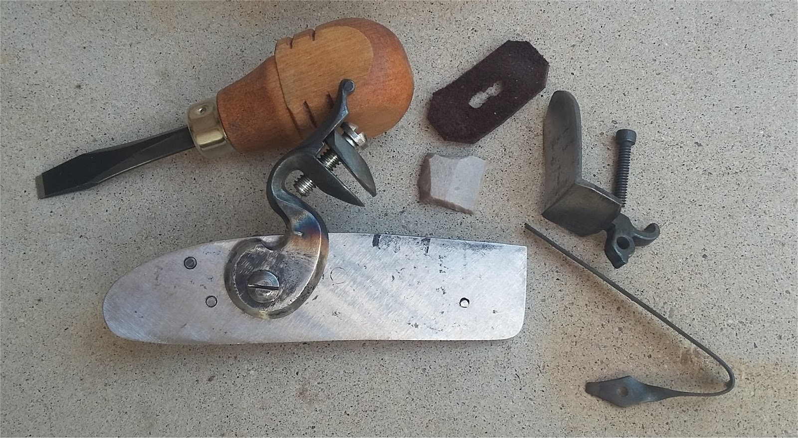 Love of Muzzle Loaders: Making a Flintlock Lock from the parts bin