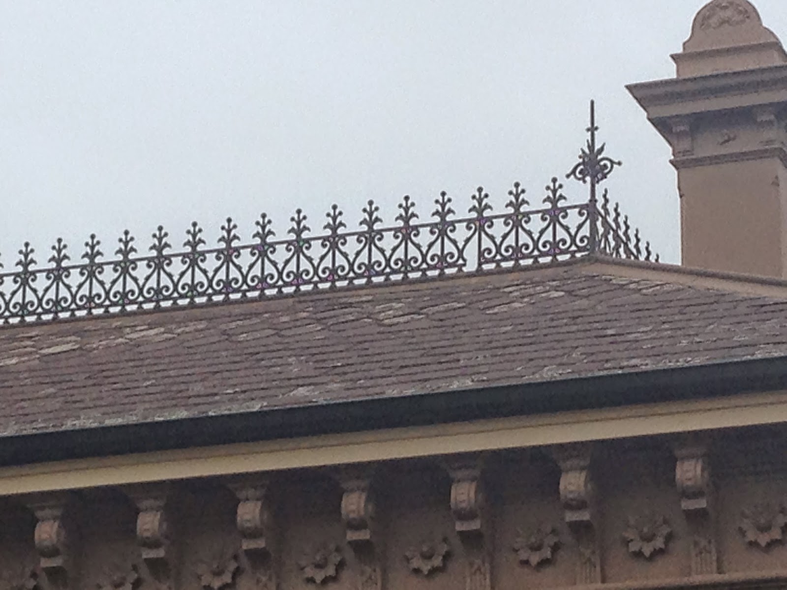 Architecture of Tiny Distinction: Victorian Iron Lace and a Little Porch