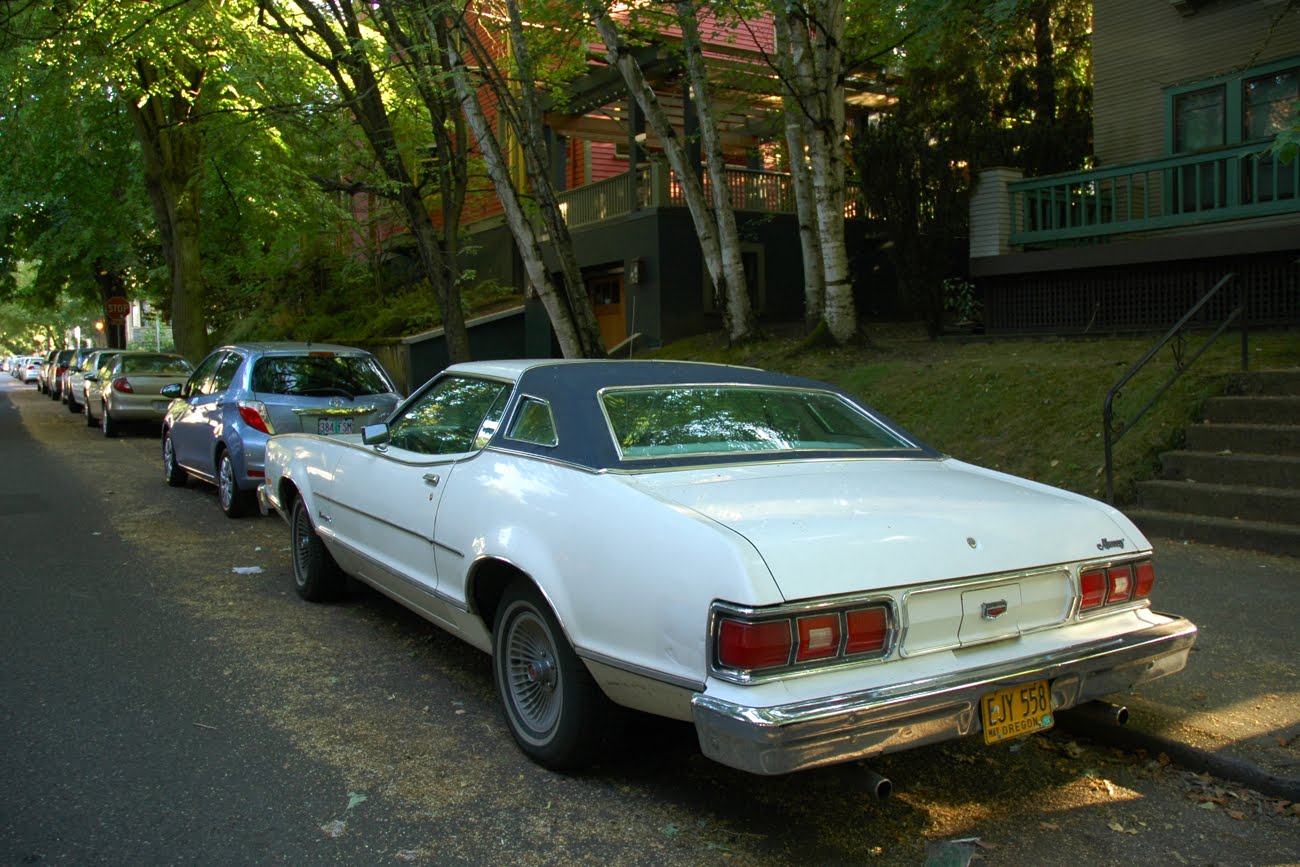 OLD PARKED CARS.: 1974 Mercury Montego MX.