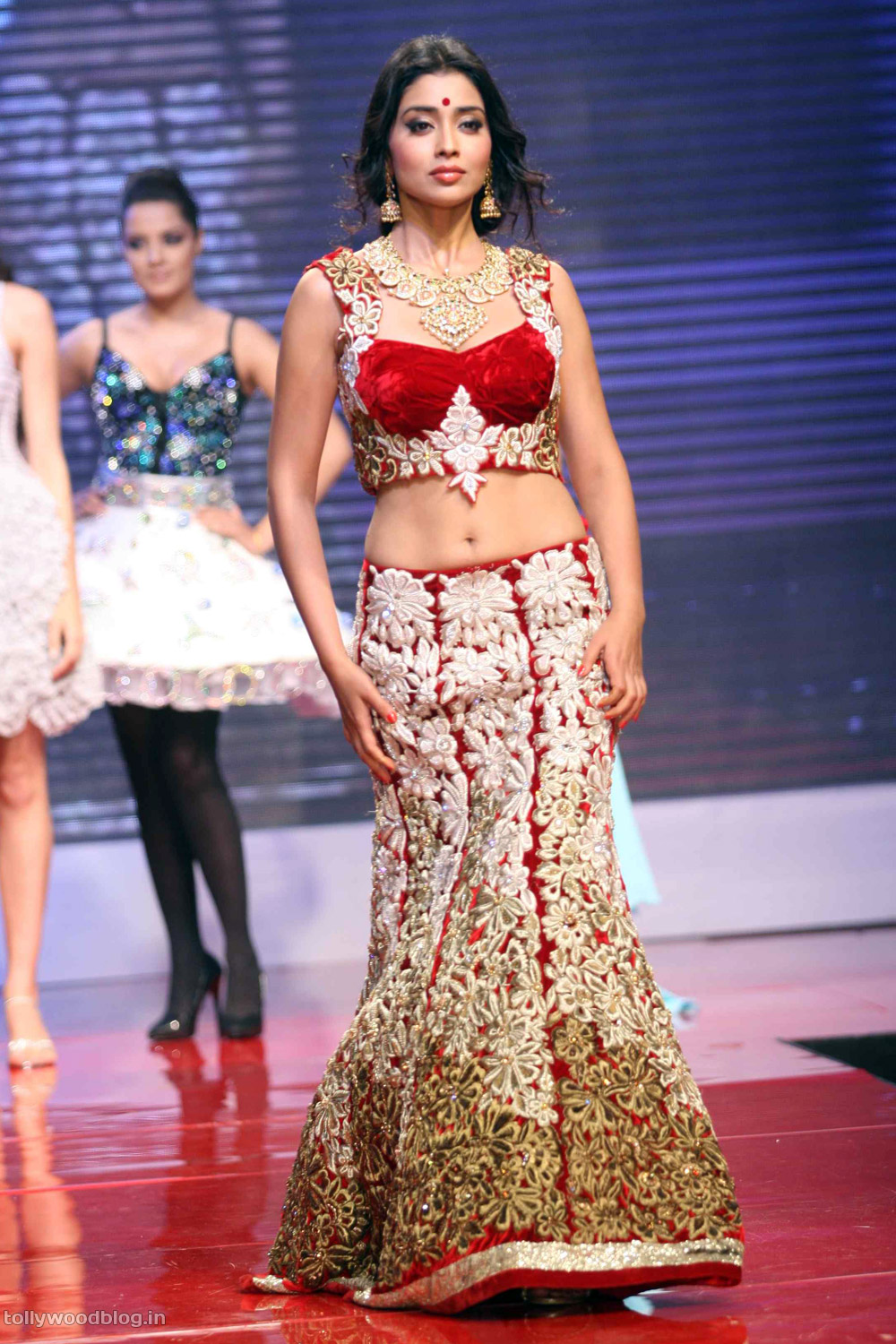 Shriya Saran Hot Ramp walk in Red Tradition Dress