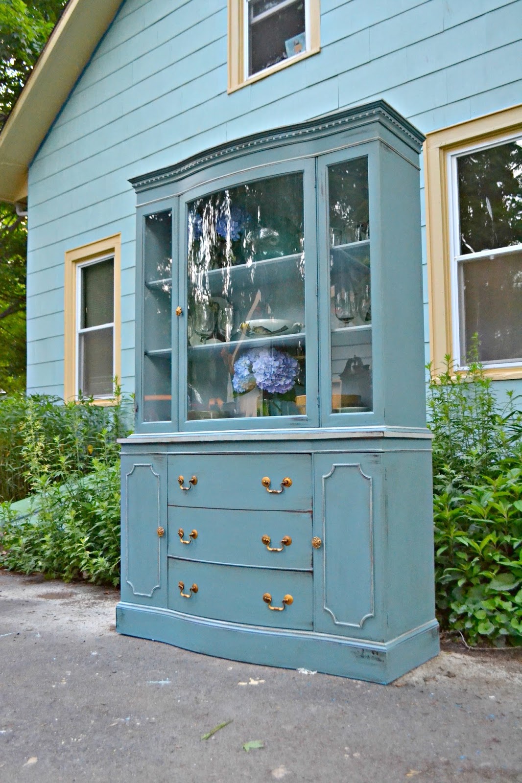 Heir and Space: An Antique China Hutch in Blue
