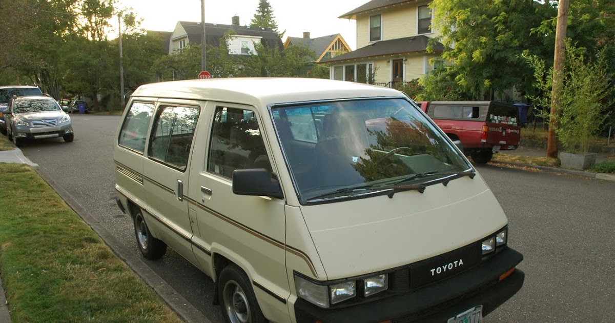 OLD PARKED CARS.: 1986 Toyota Van.