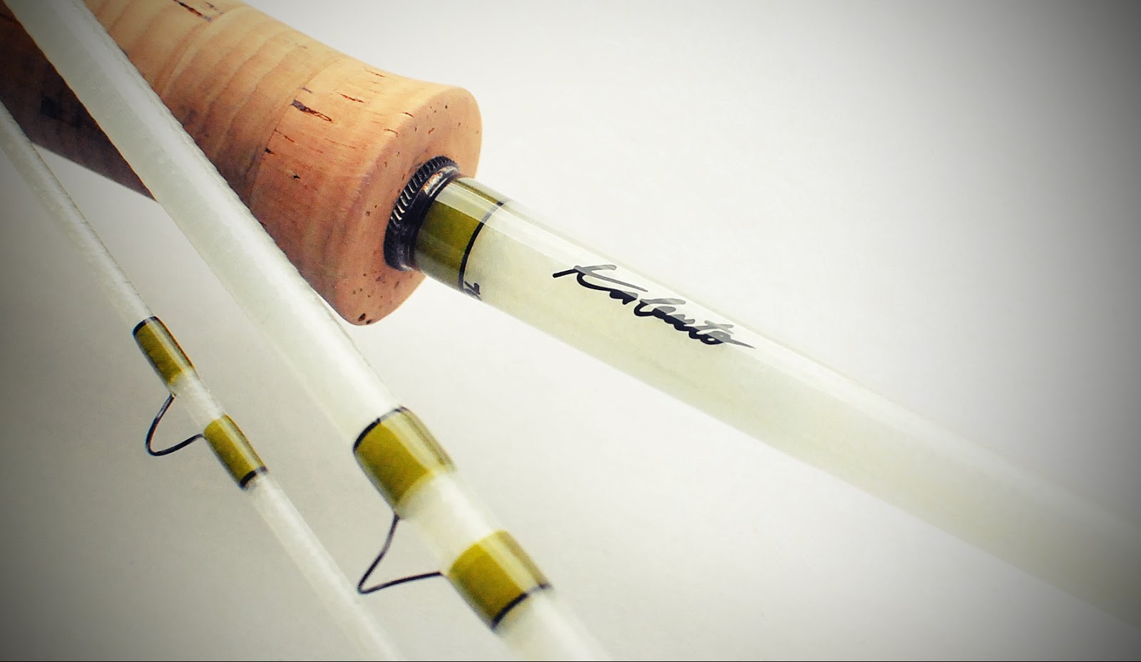 Handcrafted graphite and fiberglass fly rods: Kabuto white. Second project.