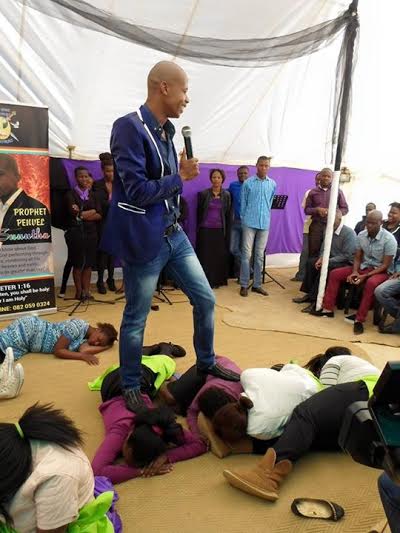 Photos: South African Pastor makes members swallow live snake during ...