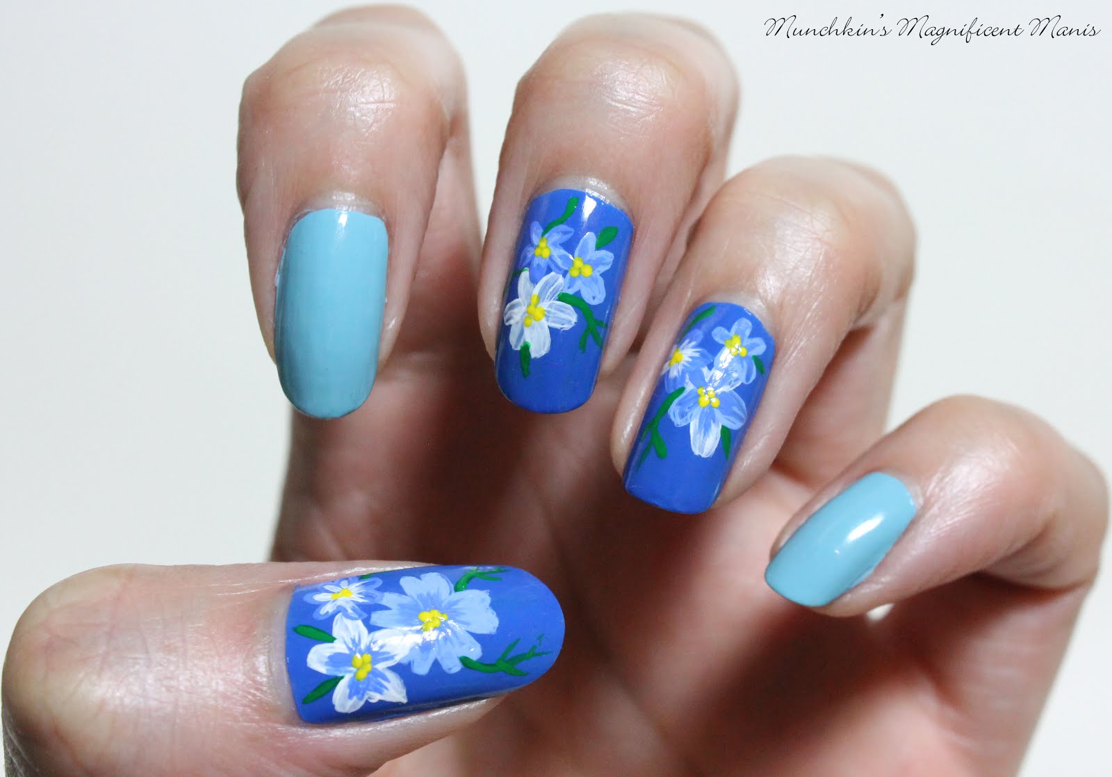 Munchkin’s Magnificent Manis: Spring in bloom- flower nail design