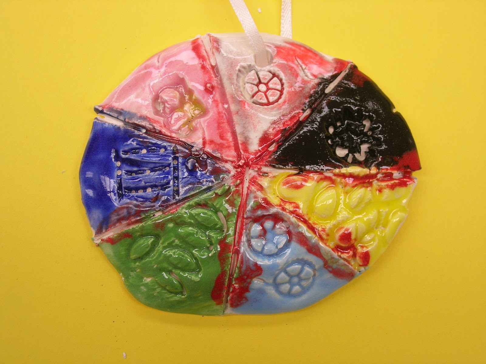 Mrs. Manzella's Student Gallery: 1ST GRADE: CLAY TEXTURED