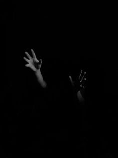 Hand Reaching Down Into Darkness