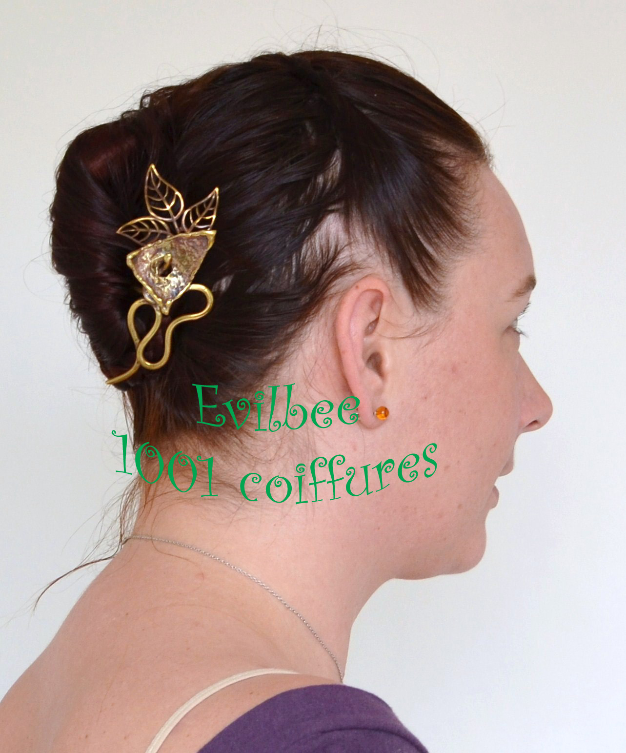 1001 coiffures: chignon banane accompagné de sa lace braid