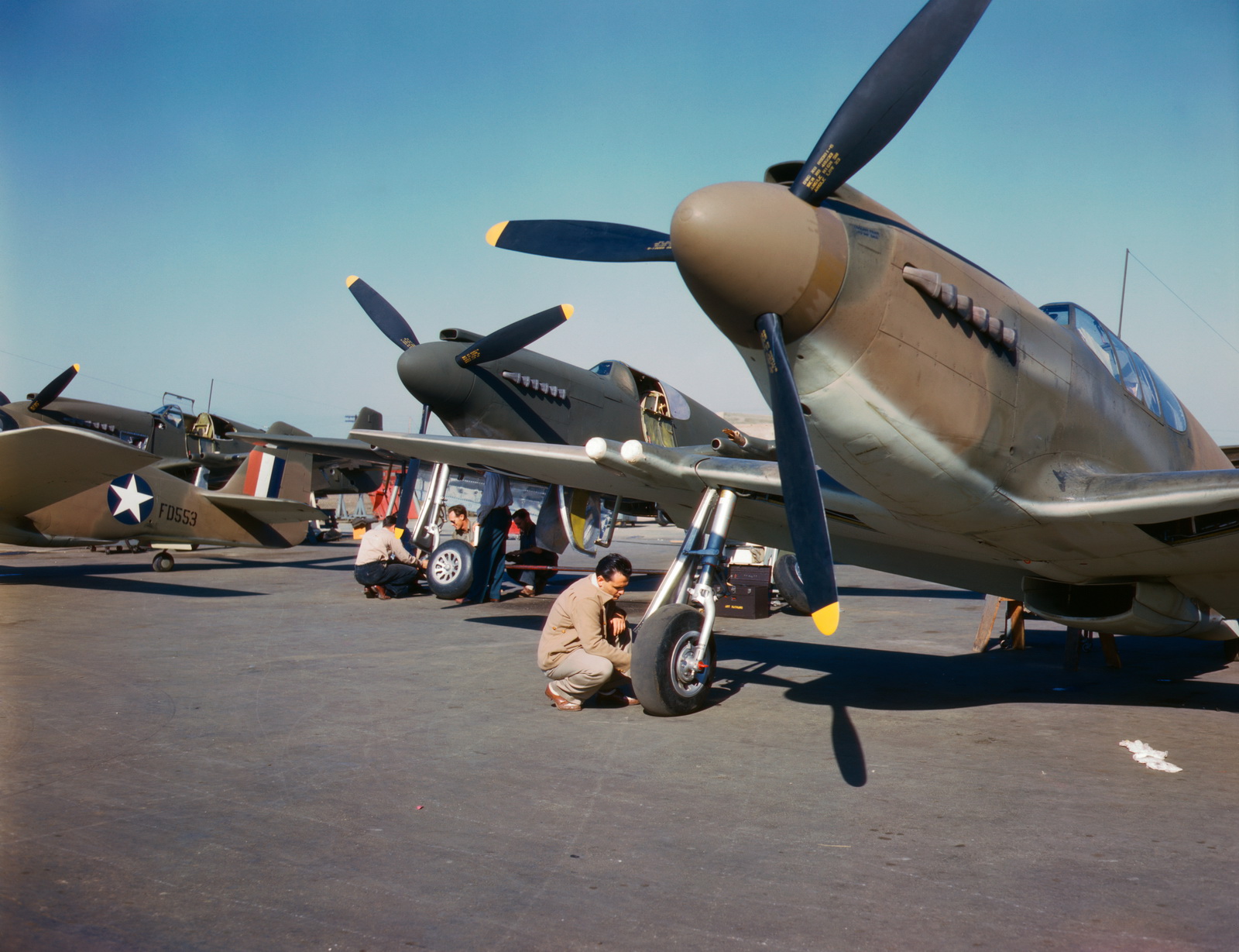 World War II Pictures In Details: P-51 fighter planes being prepared ...