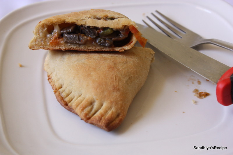 Sandhiya's Cookbook: Mushroom Calzone | Veg Calzone | Pizza Pocket