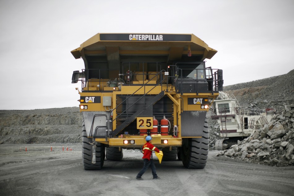 Giant Robotic Mining Trucks reduce staff from 10 to 5 per truck ...