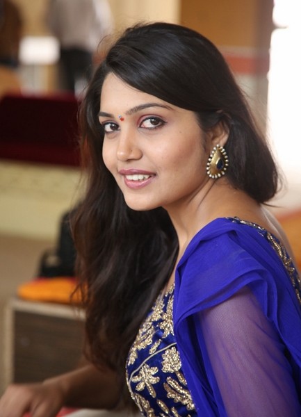 Vardana new stills in blue dress - Telugu Cinema Samacharam