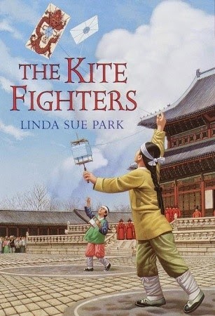 Momo celebrating time to read: The Kite fighters by Linda Sue Park
