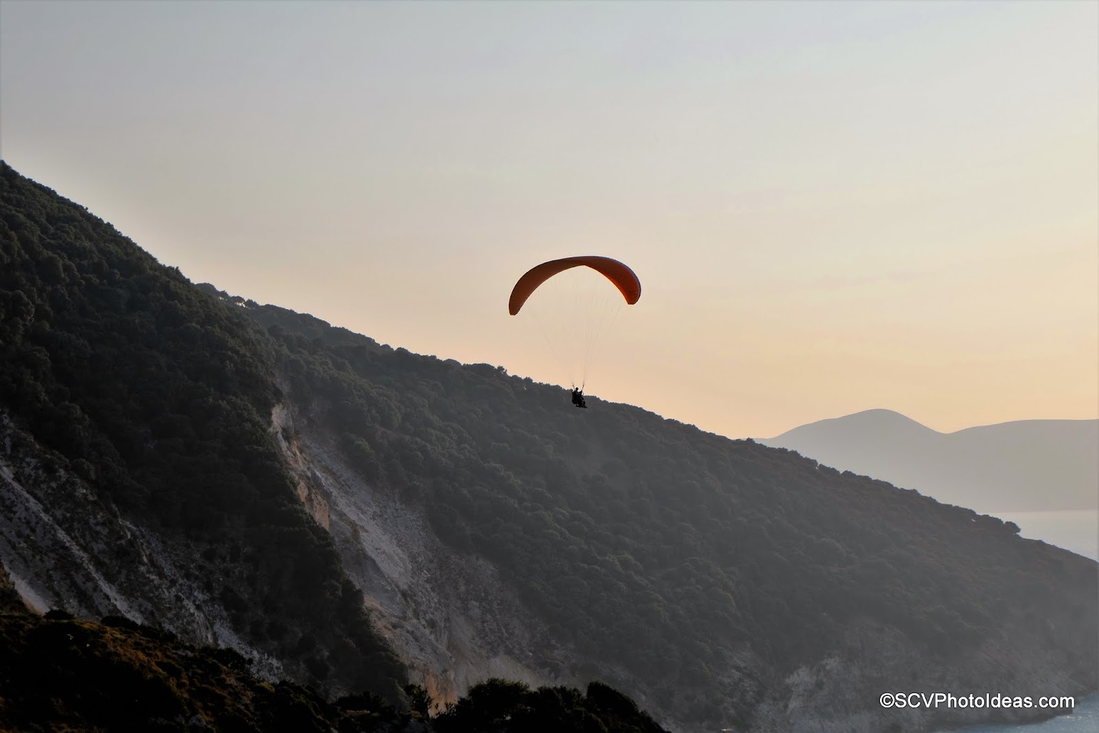 S.C.V. Photography Ideas: Paragliders at Myrtos Beach against the Sunset