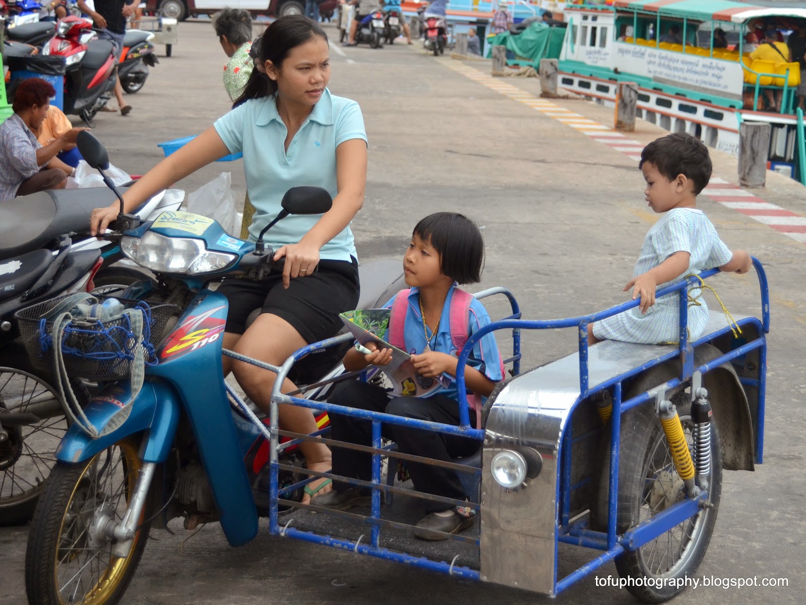 Tofu Photography: Woman on a motorbike with children in the sidecar in ...