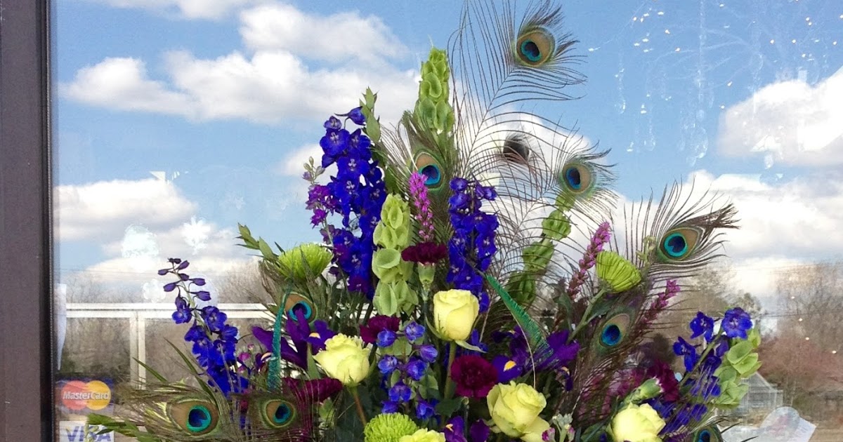 Peacock Feather Themed Flower Arrangement