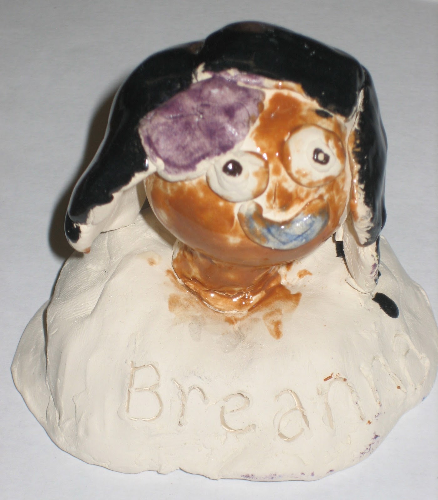 Awakening Art Teaching: Elementary Students Ceramic Self Portraits