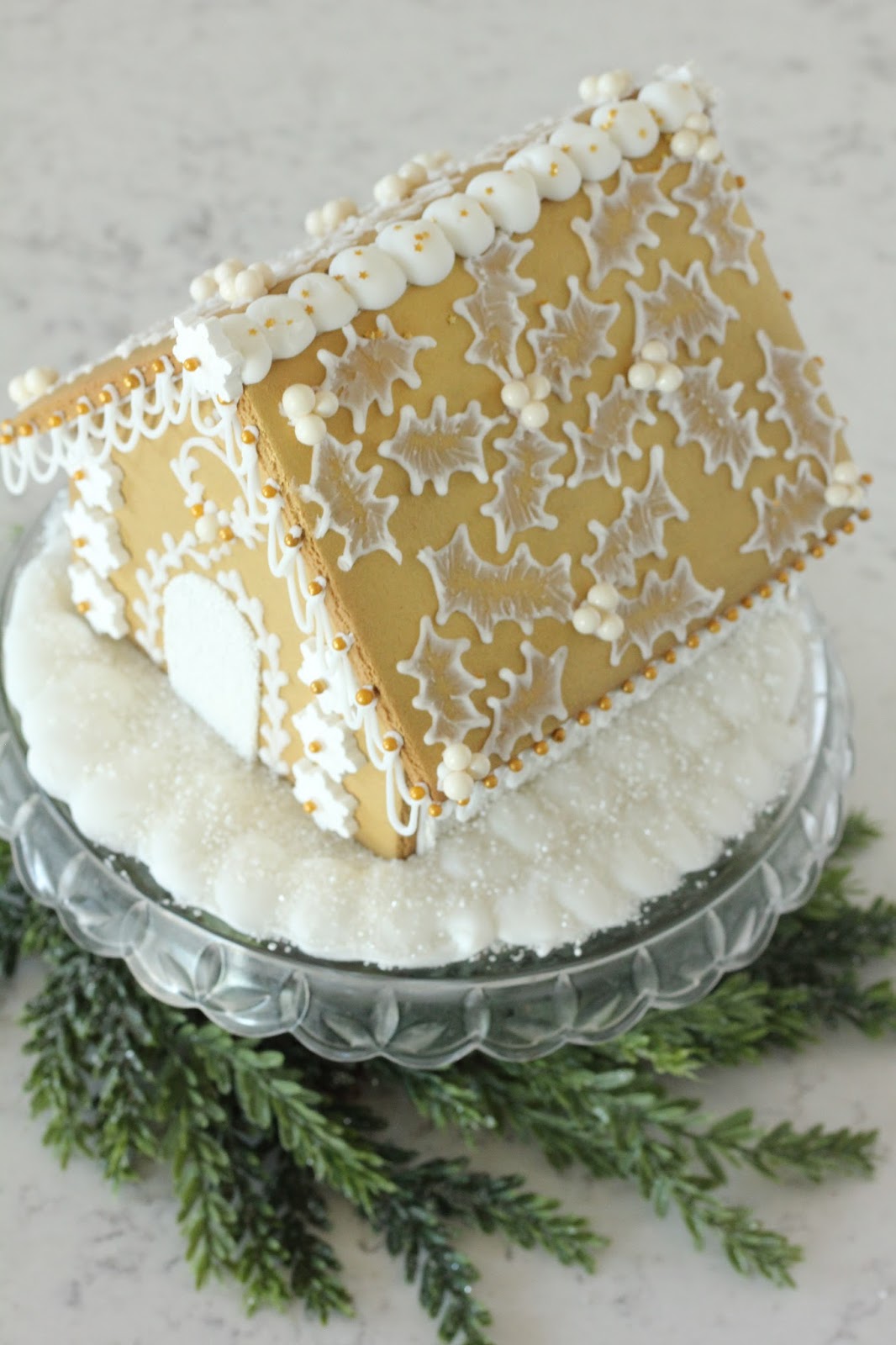 White and Gold Gingerbread House