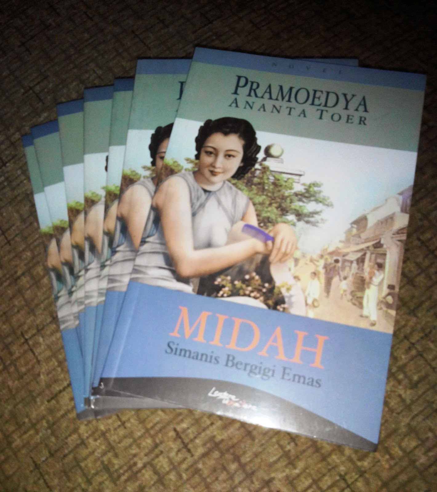 Cinta Buku: Midah Si Manis Bergigi Emas