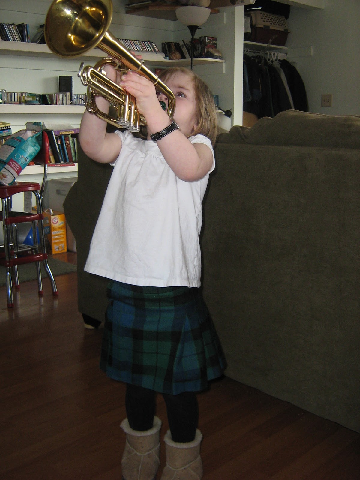 An Alaskan Odyssey: a cute kilted kid playing cornet
