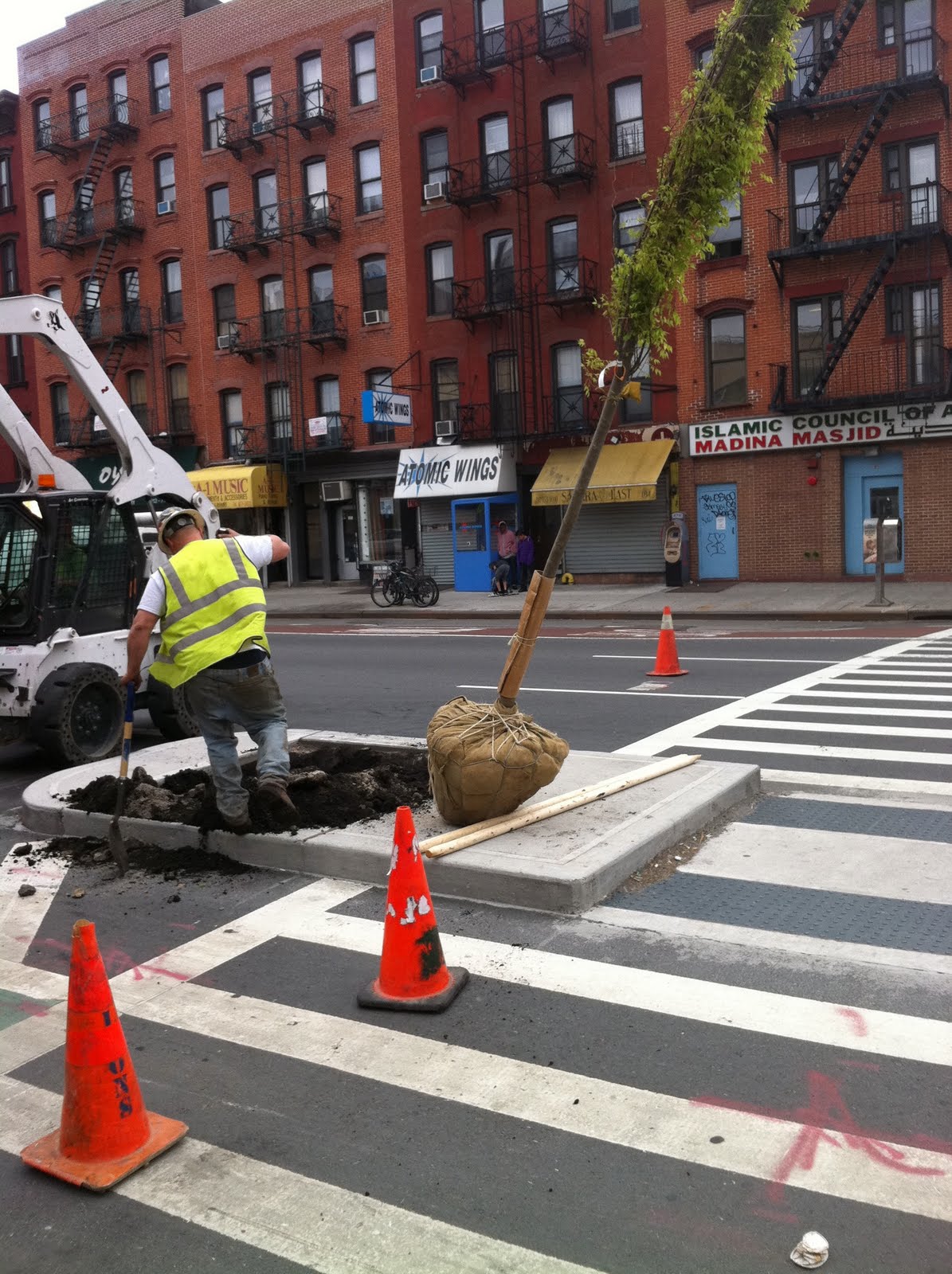 EV Grieve: Breaking: First Avenue bike lane buffers getting buffed up ...