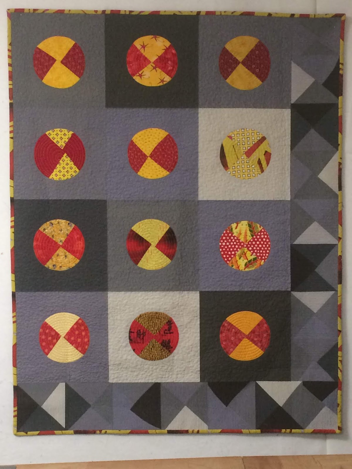 AHIQ: Improvisational Utility Quilts: Hourglass quilt done?