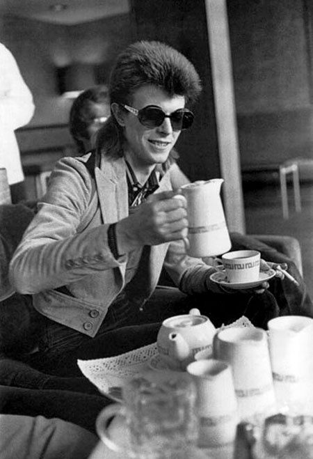 black or white: > famous people drinking coffee