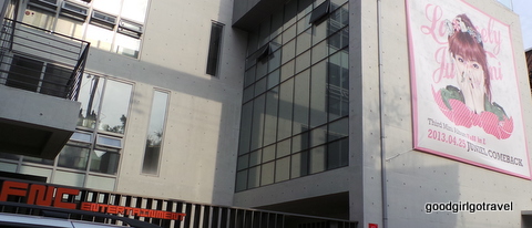 Good girl go travel: FNC Entertainment new building