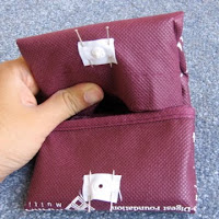 Sewing in Toronto: Adding snaps to a tote bag - so it stays folded