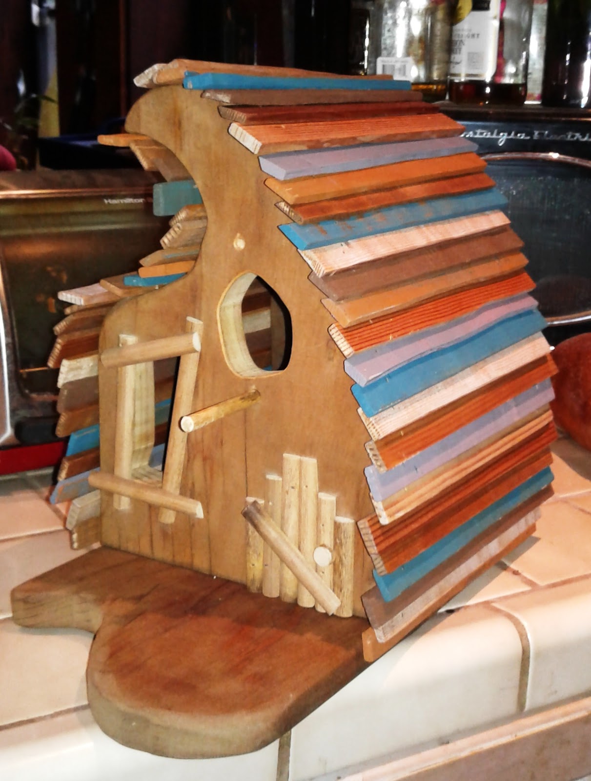 Recycled Miracles: Recycled wood birdhouse