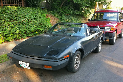 OLD PARKED CARS.: 1980 Triumph TR7 Spider.