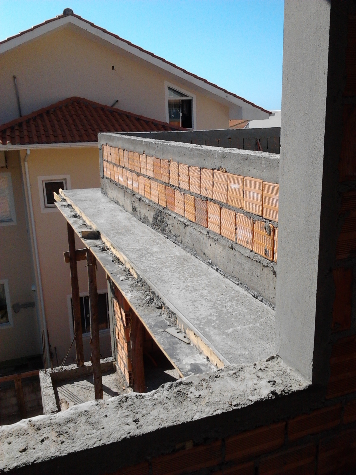 obra casa canela: 10 de dezembro - reboco externo pav. térreo