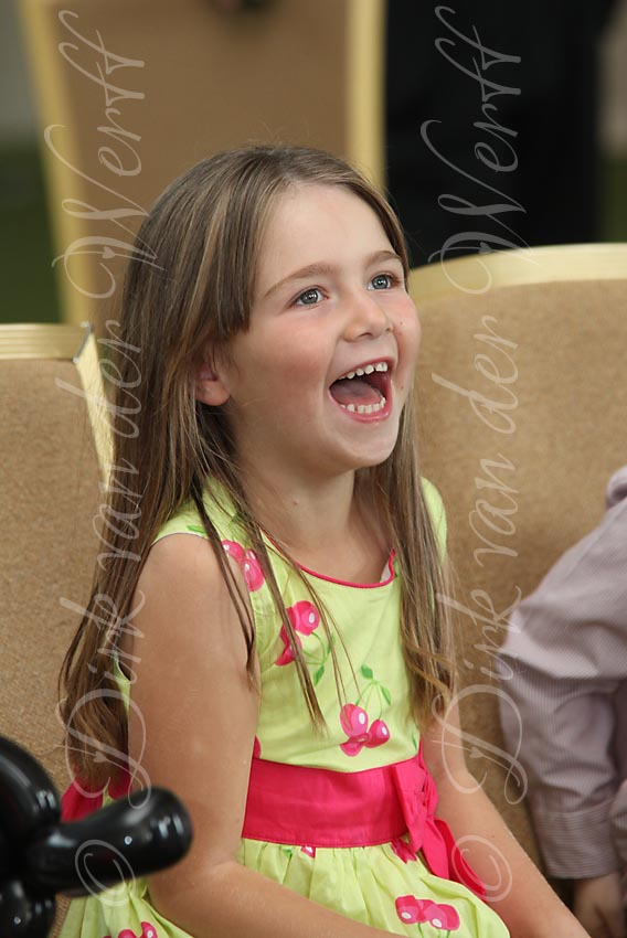 HAPPINESS FROM ONE OF THE MANY YOUNGSTERS ENTERTAINED BY THE MAGICIAN ...