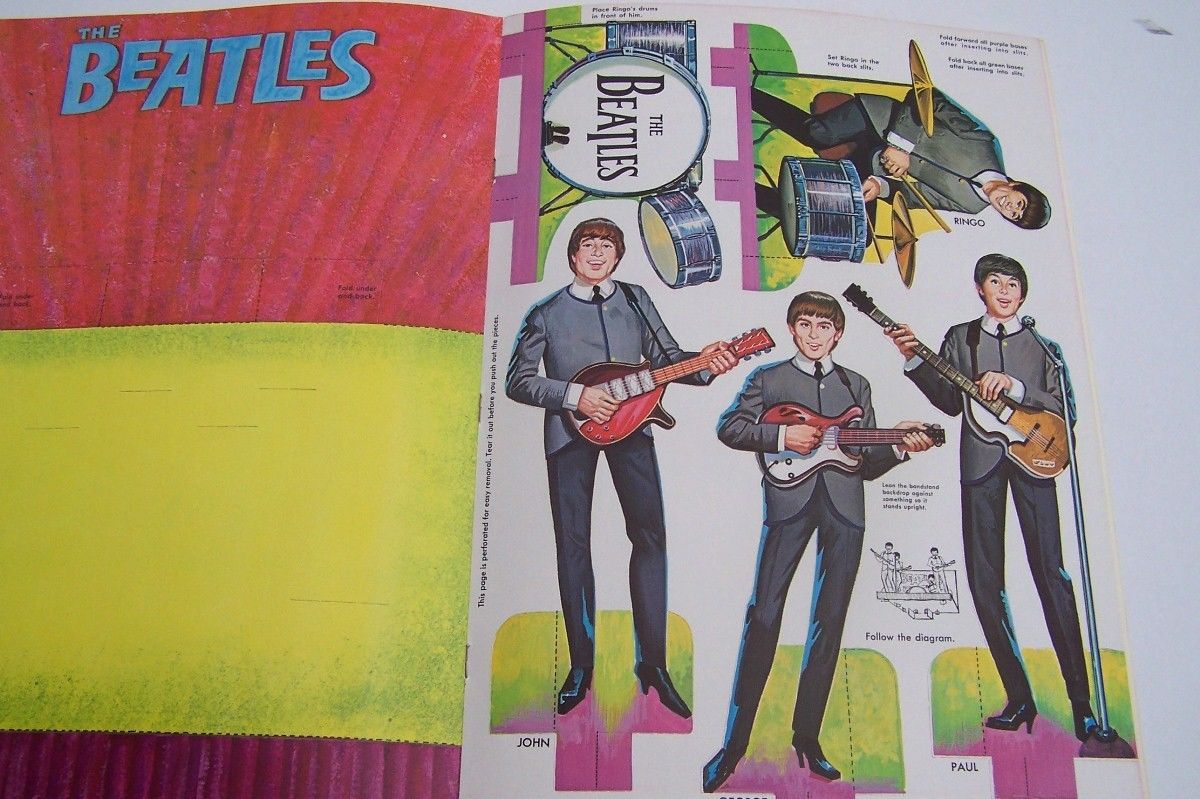 Vintage Beatles punch-out portrait book