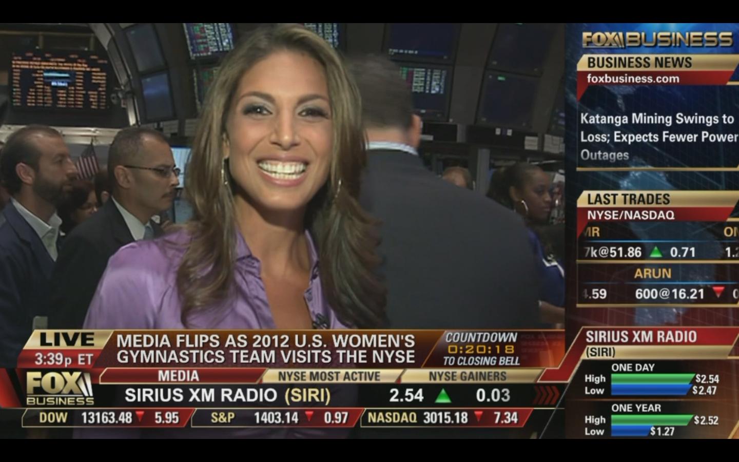 Ladies in Satin Blouses: Fox Business anchor in purple silk blouse