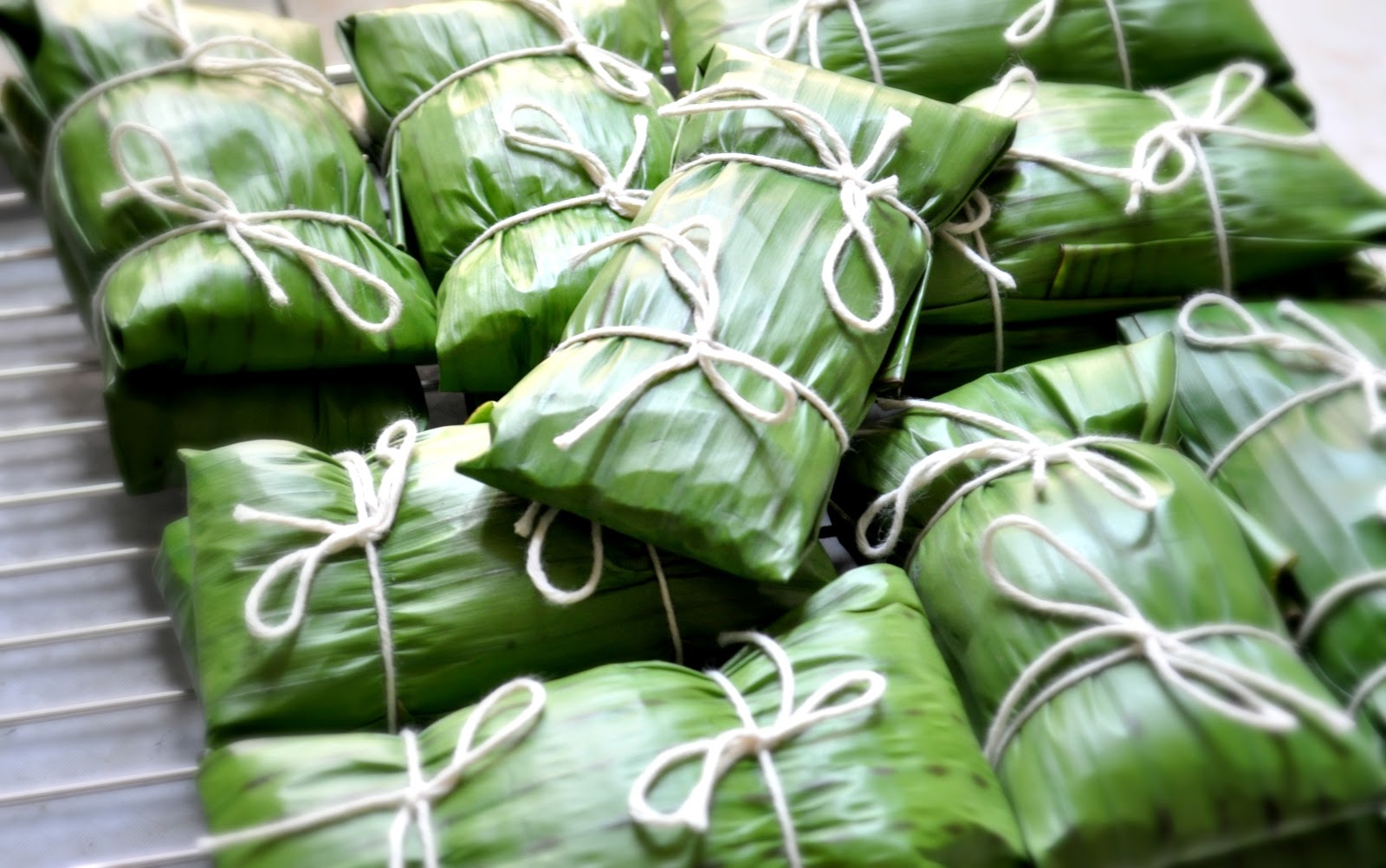 Suman Sa Lihiya With Latik Wrapped Rice Cake With Coco Butter Syrup