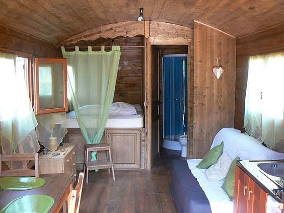 mytinyhousedirectory: Mini Vardo with raised bed for storage