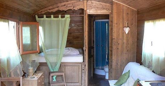 mytinyhousedirectory: Mini Vardo with raised bed for storage