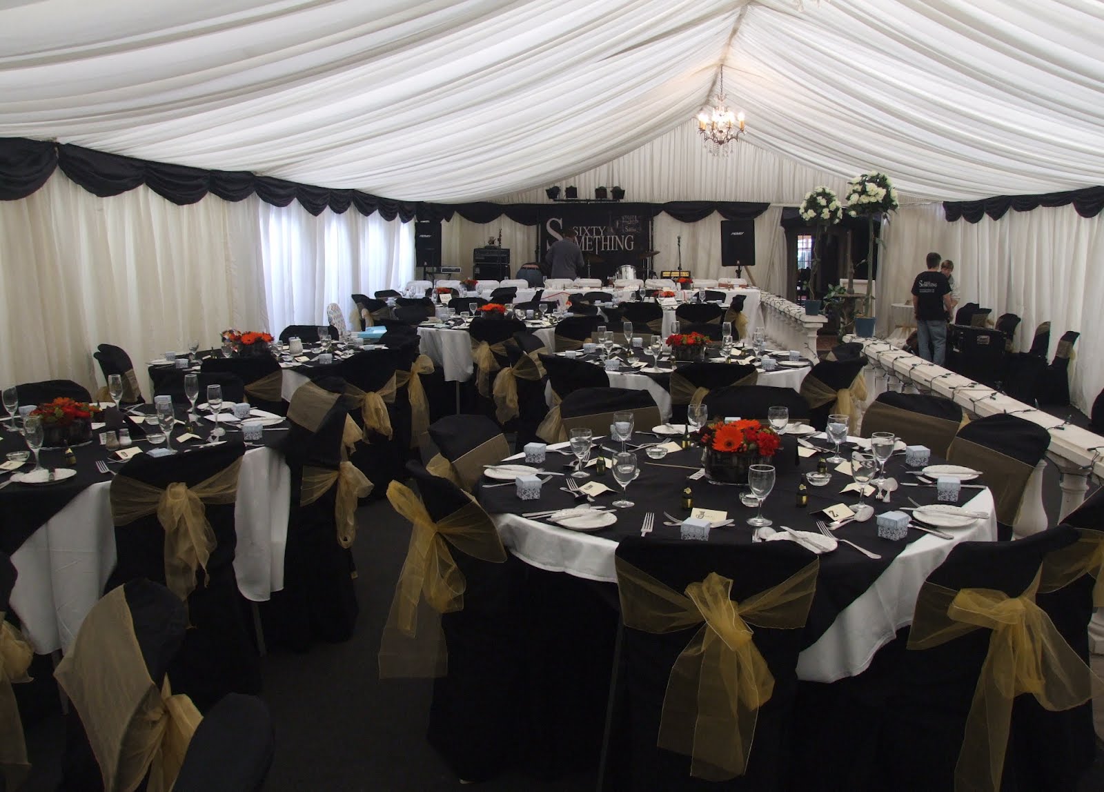 RJ's Florist: Ivory, red and orange wedding flowers