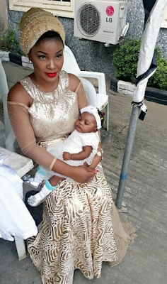 Prince Iyke Olisa and wife dedicate their daughter in church