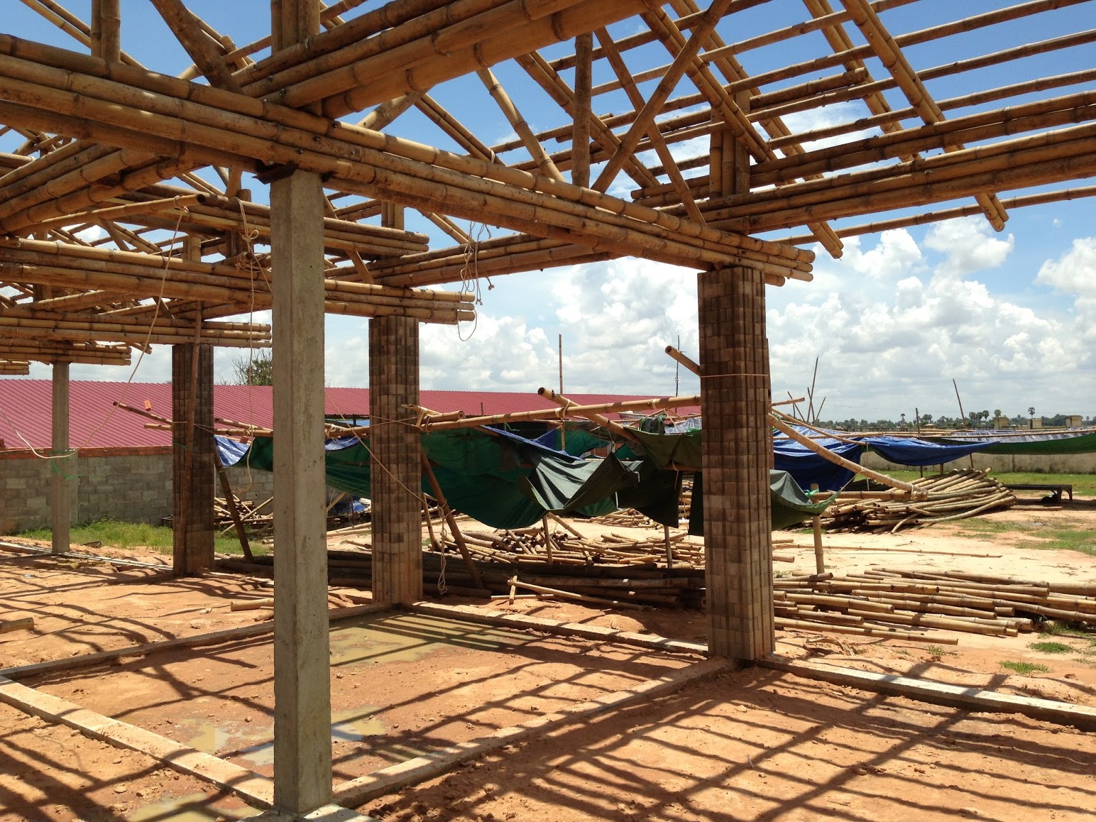 KOMITU: UPDF Community meeting hall with bamboo structures