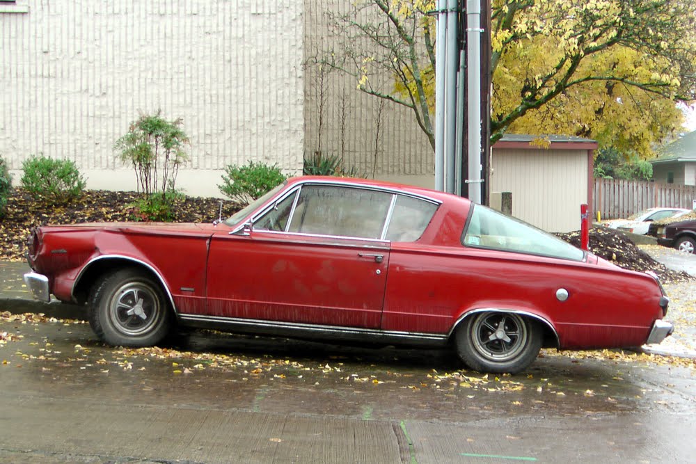 OLD PARKED CARS.: 1966 Plymouth Barracuda.