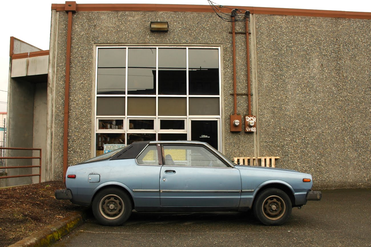 OLD PARKED CARS.: 1979 Datsun 310GX.
