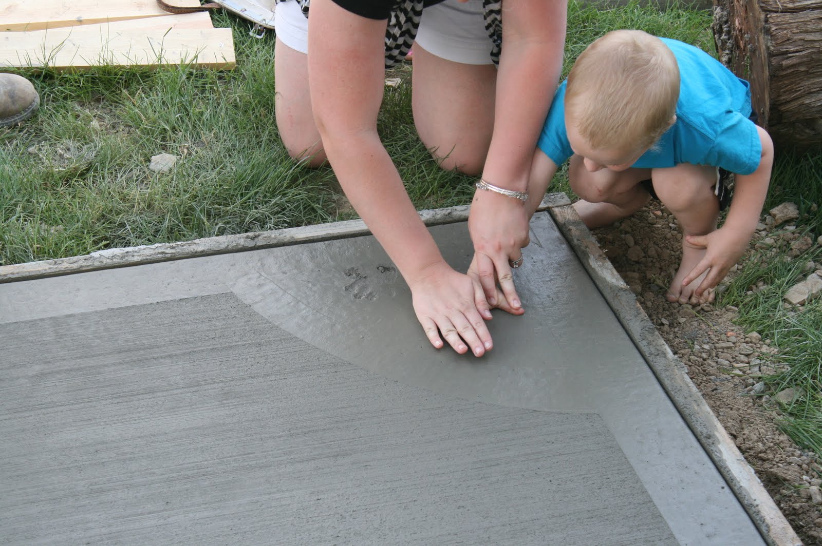 To the moon and back...: Handprints in the Cement